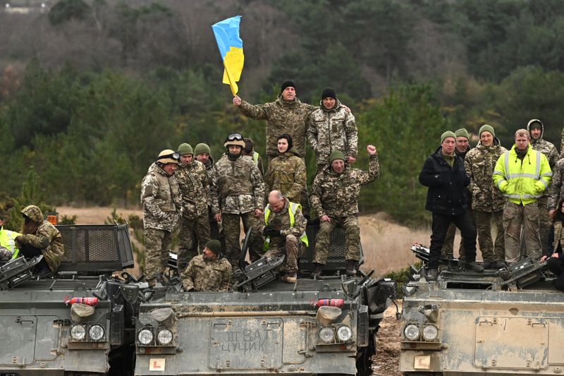 War anniversary: Ukraine defends frontline, Putin talks up nuclear arsenal