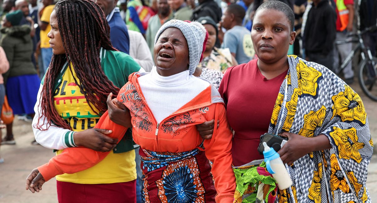 Frantic search for dozens missing in George building collapse