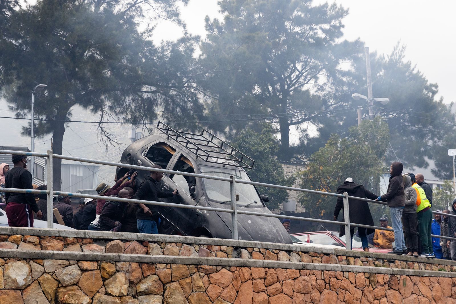Taxi drivers run riot, torch streets of Hout Bay over bus routes