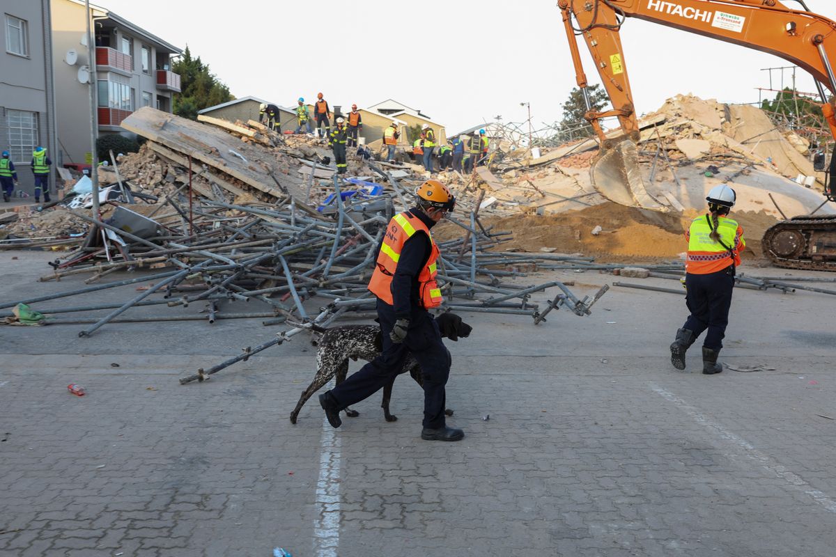 Frantic search for dozens missing in George building collapse