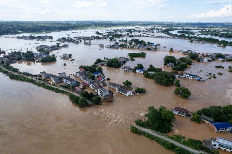Typhoon remnants kill four in China, sever transport, power links