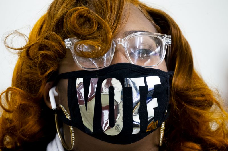 With short lines and face masks, U.S. Election Day gets off to an ...