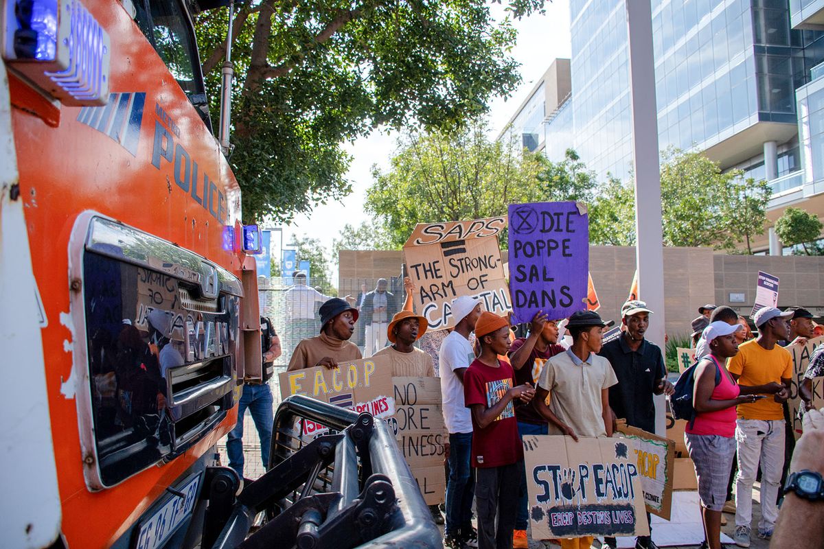 Climate activists stand in solidarity following arrests outside ...