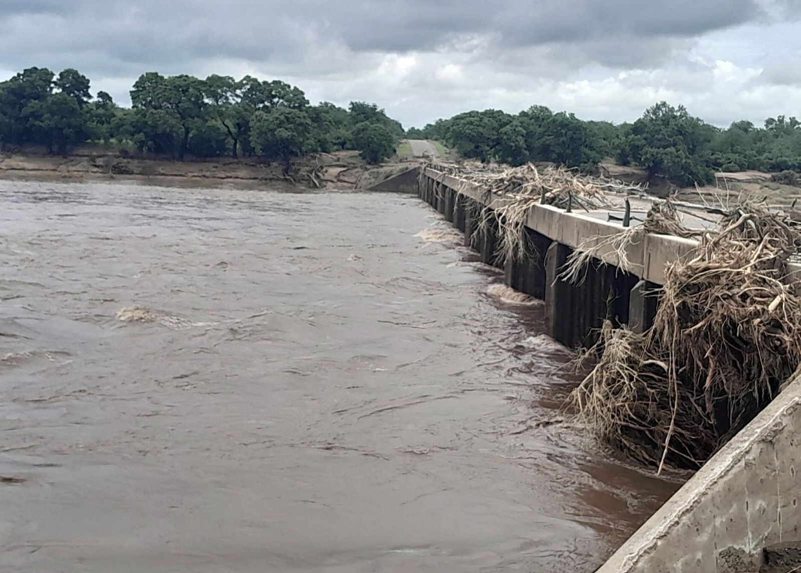 Relief in the skies, ruin on the ground as deadly floods kill 37 and ...