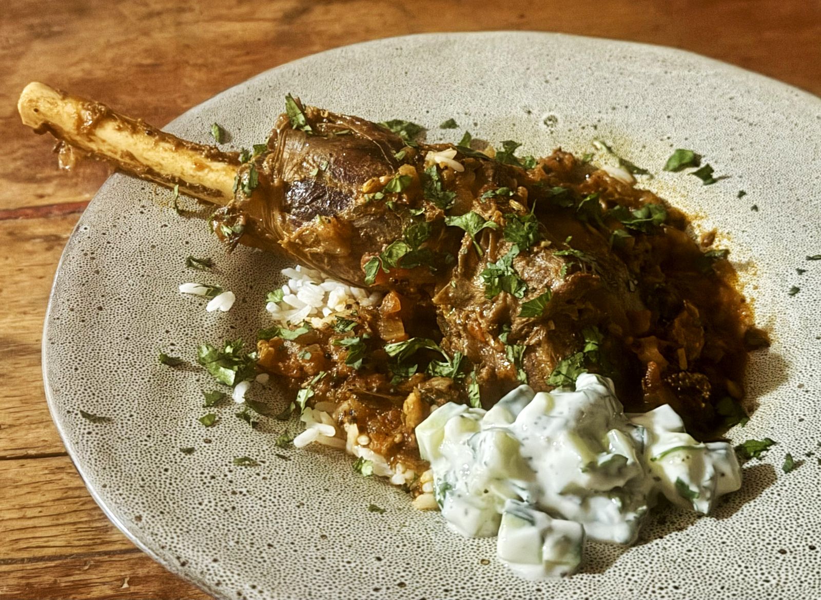 Springbok shank curry with cucumber raita